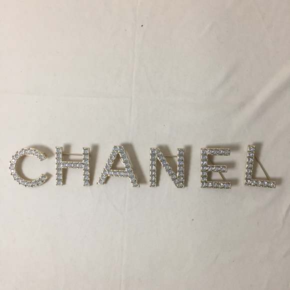 CHANEL | Jewelry | Chanel Gold Crystal Spelled Out Chanel Letter Brooch ...